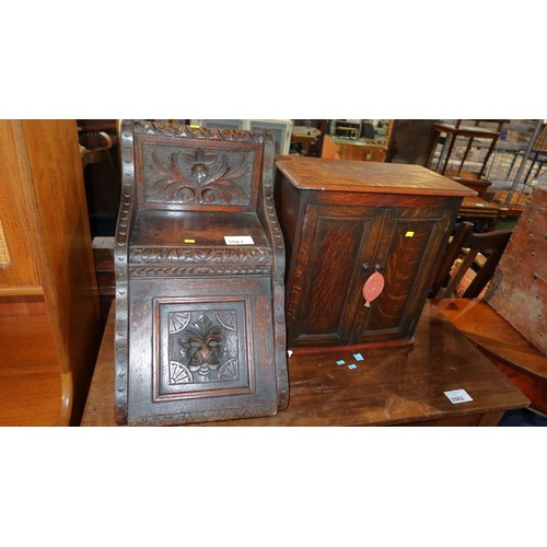 A vintage carved oak coal box with a lift lid and a small wall cabinet ...