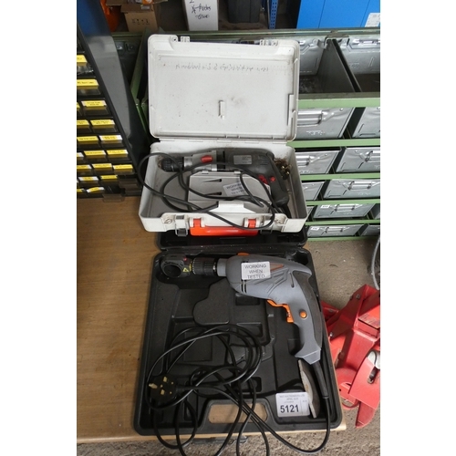 1 x Challenge Xtreme drill and 1 x Performance Power drill - both 240v