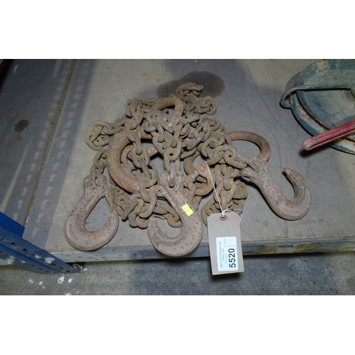 A three leg / three hook lifting chain assembly (SWL not visible)