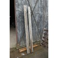 2 x concrete gate posts, each measuring approx 9cm x 10cm x 244cm
