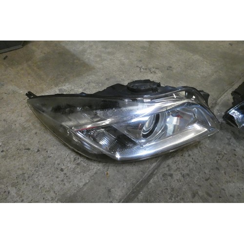A pair of genuine Hella Xenon headlights to suit Vauxhall Insignia 2008 ...