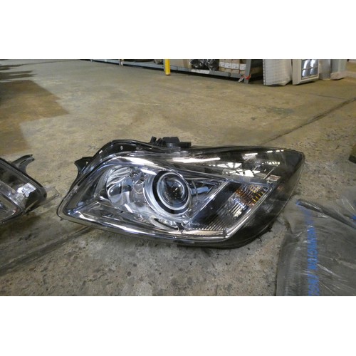 A pair of genuine Hella Xenon headlights to suit Vauxhall Insignia 2008 ...