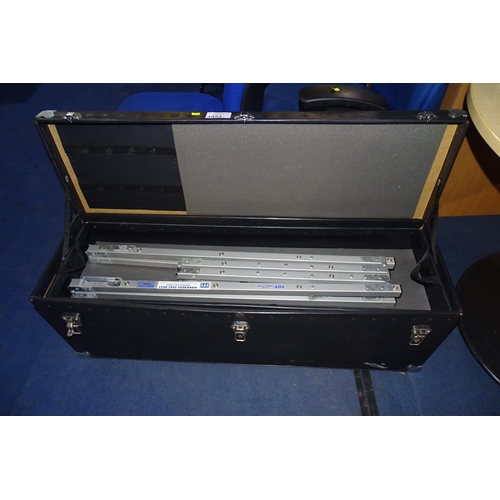 A Harkness Easi-rect projection screen frame in a black transit case ...