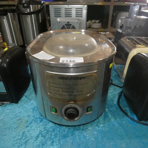 A commercial stainless steel ice cream making machine by Robot Coupé ...