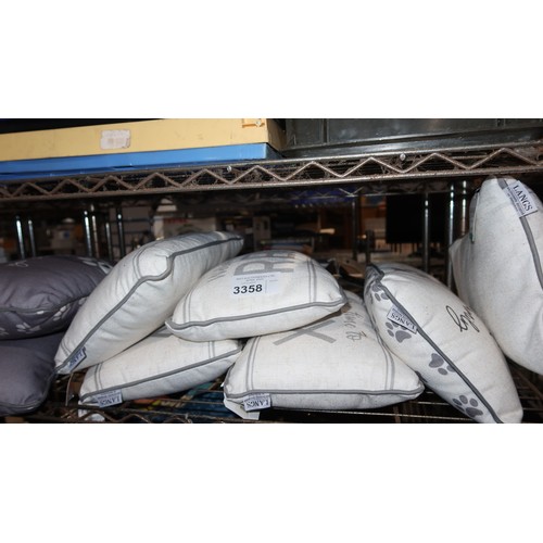 8 x various Langs small novelty dog themed cushions. Contents of 1 shelf