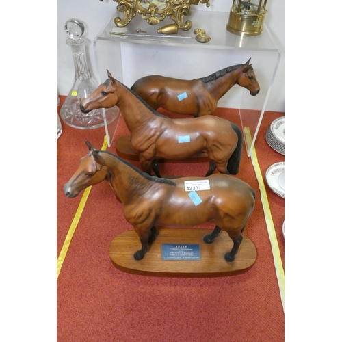 Three large Beswick figures of race horses: "Arkle", "Red Rum" and ...