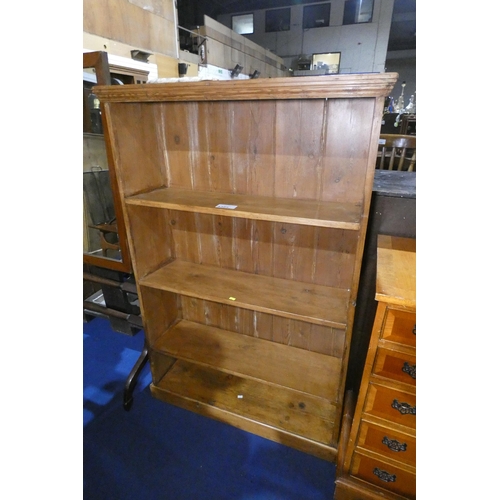 A vintage pine floor standing open fronted bookcase of four shelves ...