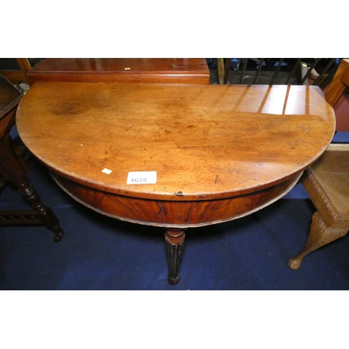 A vintage mahogany semi-circular side table on fluted legs ...