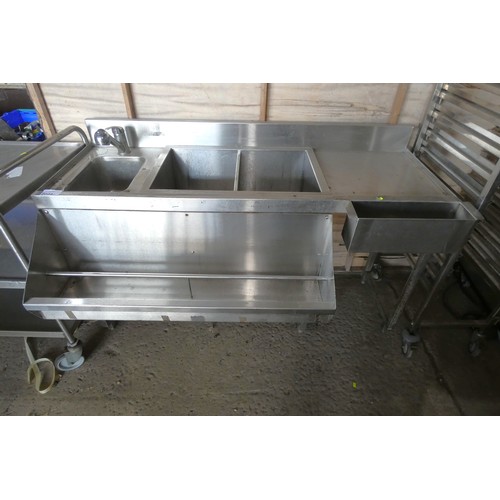 A commercial stainless steel 3 bowl bar sink with retractable spray tap ...