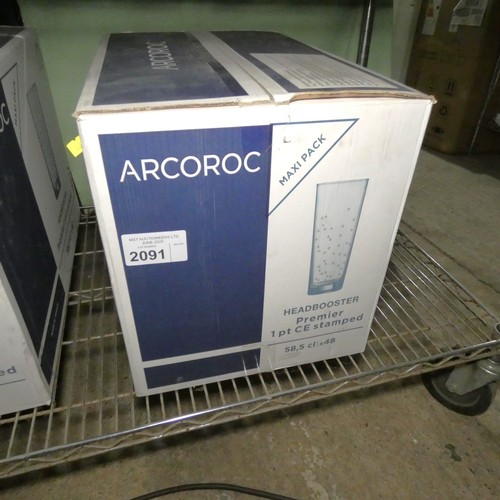 An unused box of 48 CE stamped pint glasses by Arcoroc type Headbooster
