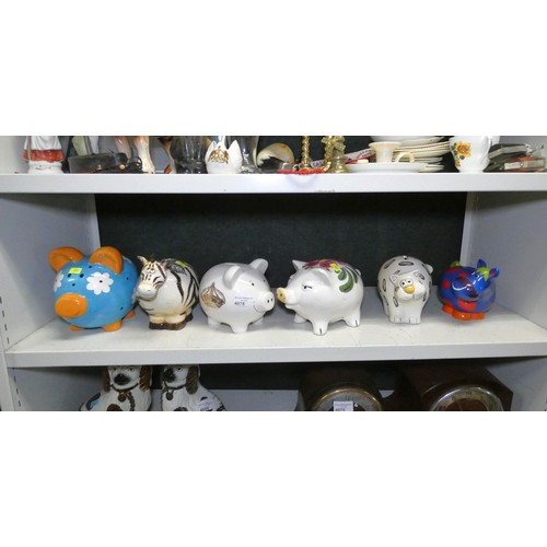 Six decorative money boxes