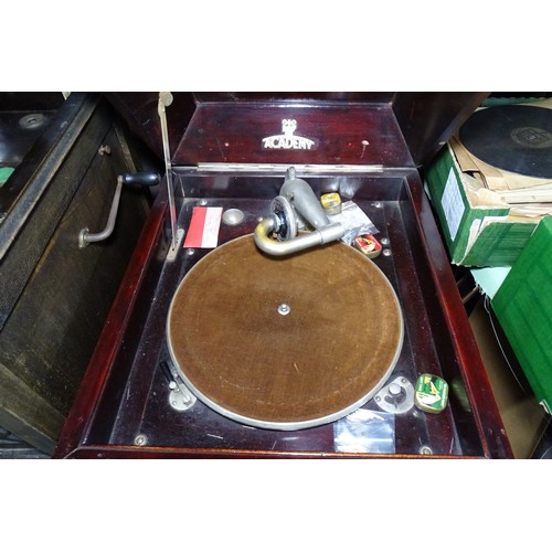 A vintage wooden floor standing Academy wind up gramophone with a lift ...