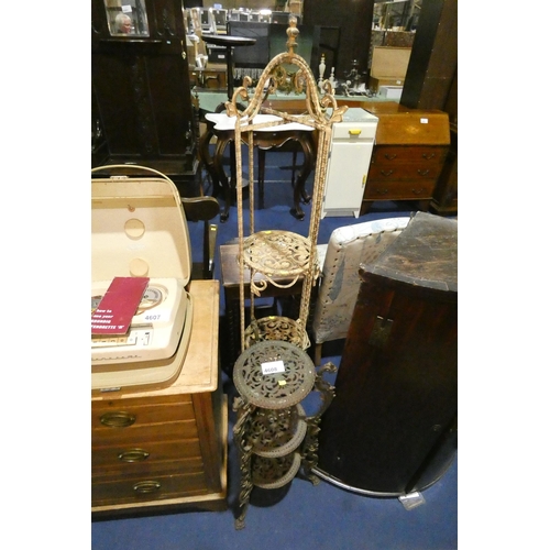 Two vintage cast iron 3 tier saucepan stands