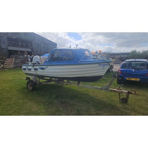 A blue & white Bonwitco-With 15ft boat including a single axle boat ...