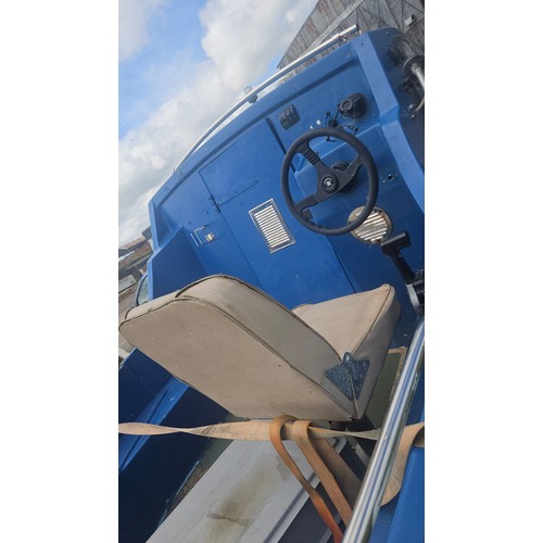 A blue & white Bonwitco-With 15ft boat including a single axle boat ...