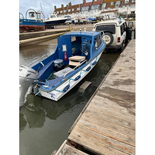 A blue & white Bonwitco-With 15ft boat including a single axle boat ...