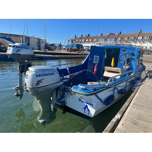 A blue & white Bonwitco-With 15ft boat including a single axle boat ...