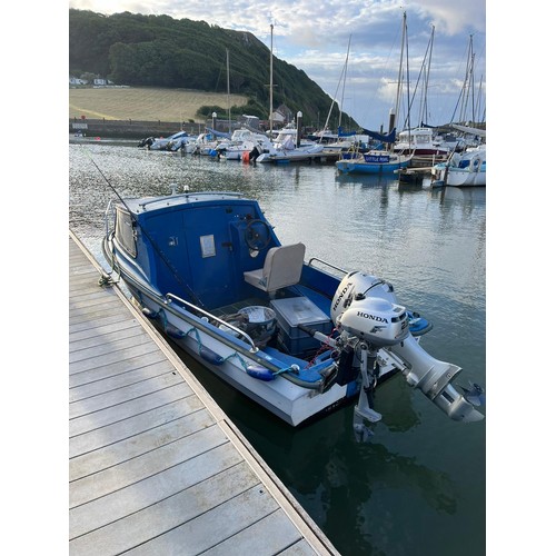 A blue & white Bonwitco-With 15ft boat including a single axle boat ...
