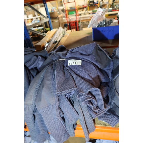 A quantity of ex-MOD blue jumpers (approx 10)