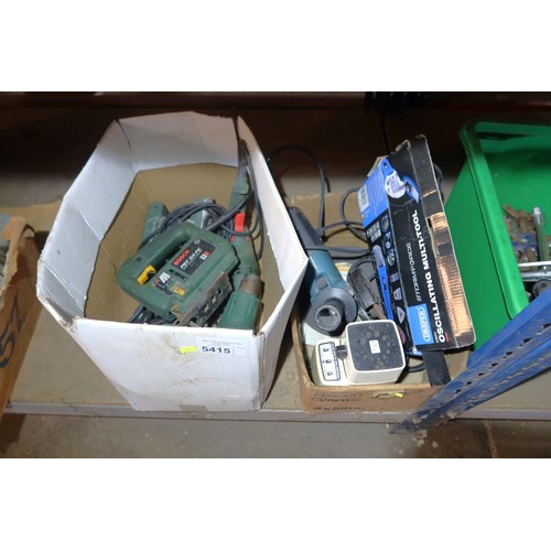 2 boxes containing a quantity of various 240v power tools including a ...