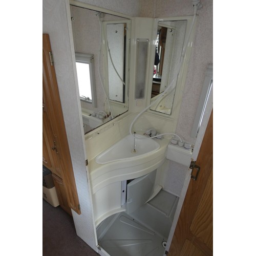 An Avondale Land Ranger 6400 S twin axle, braked, 5 berth caravan ...