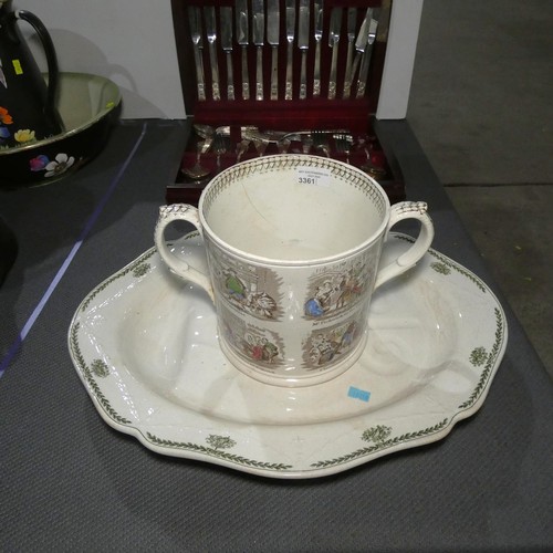 A large pictorial two handled beaker and a large meat plate
