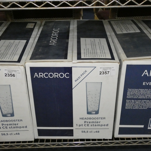 An unused box of 48 CE stamped pint glasses by Arcoroc type Headbooster