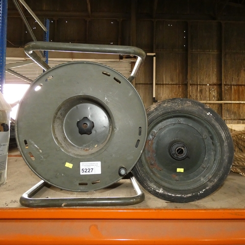 1 x green metal cable reel and 1 x small axle unit with 2 x rims ...