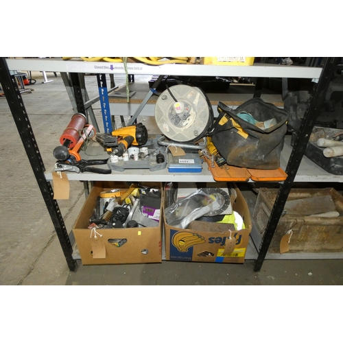 A quantity of various tools, an extension lead, straps, a Montana nail ...