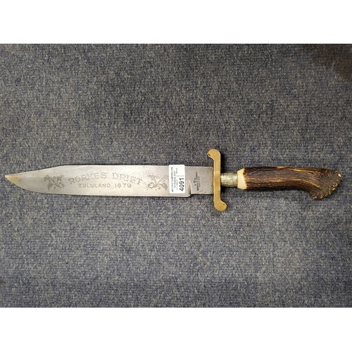 A decorative vintage fixed blade knife with stag antler handle, blade ...