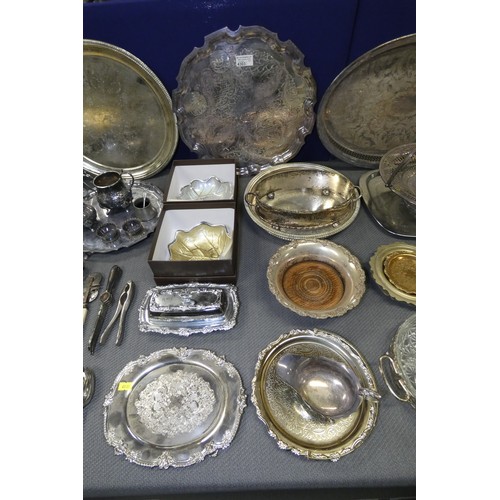 A large quantity of miscellaneous decorative silver plated ware and cutlery