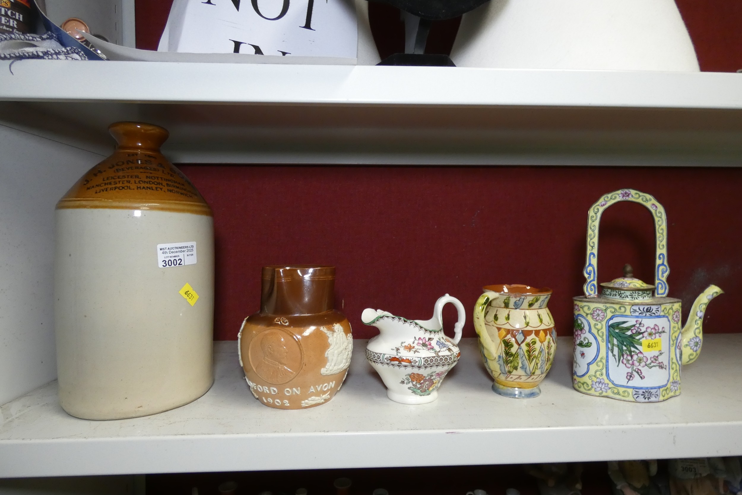 A Doulton stoneware "Bradford on Avon" jug, a large stoneware cider ...