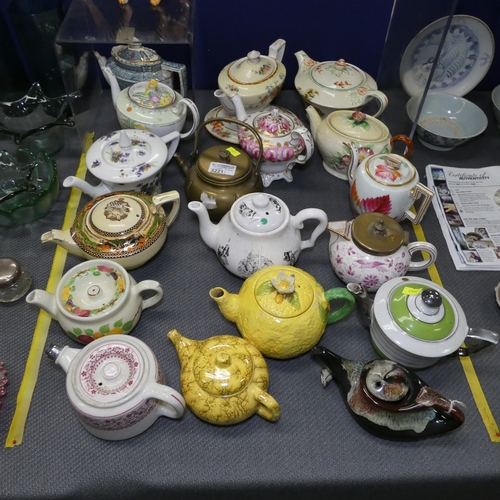 A collection miscellaneous decorative small teapots