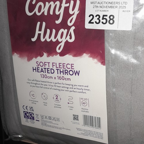 A Comfy Hugs soft fleece heated throw 130 x 160cm with 10 heat settings ...