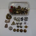 A quantity of miscellaneous regimental and military buttons and badges ...