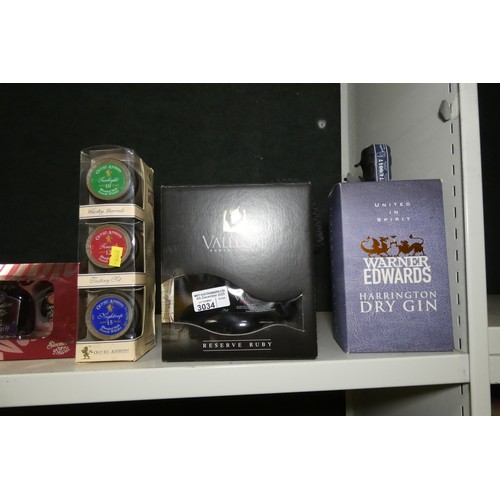 A boxed bottle of Harrington Dry Gin, a boxed bottle of Vallegre Ruby ...