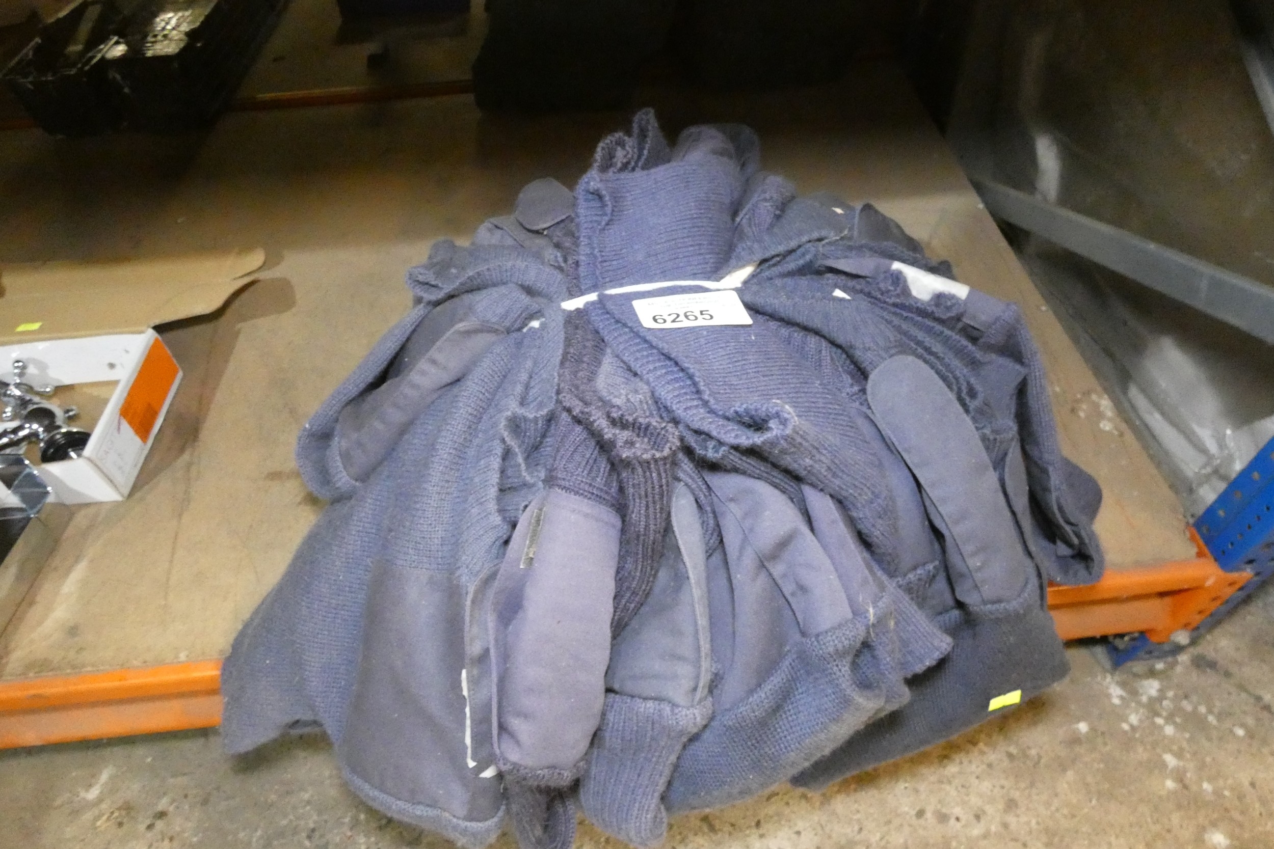 A quantity of ex-MOD blue jumpers (quantity is approx 10)