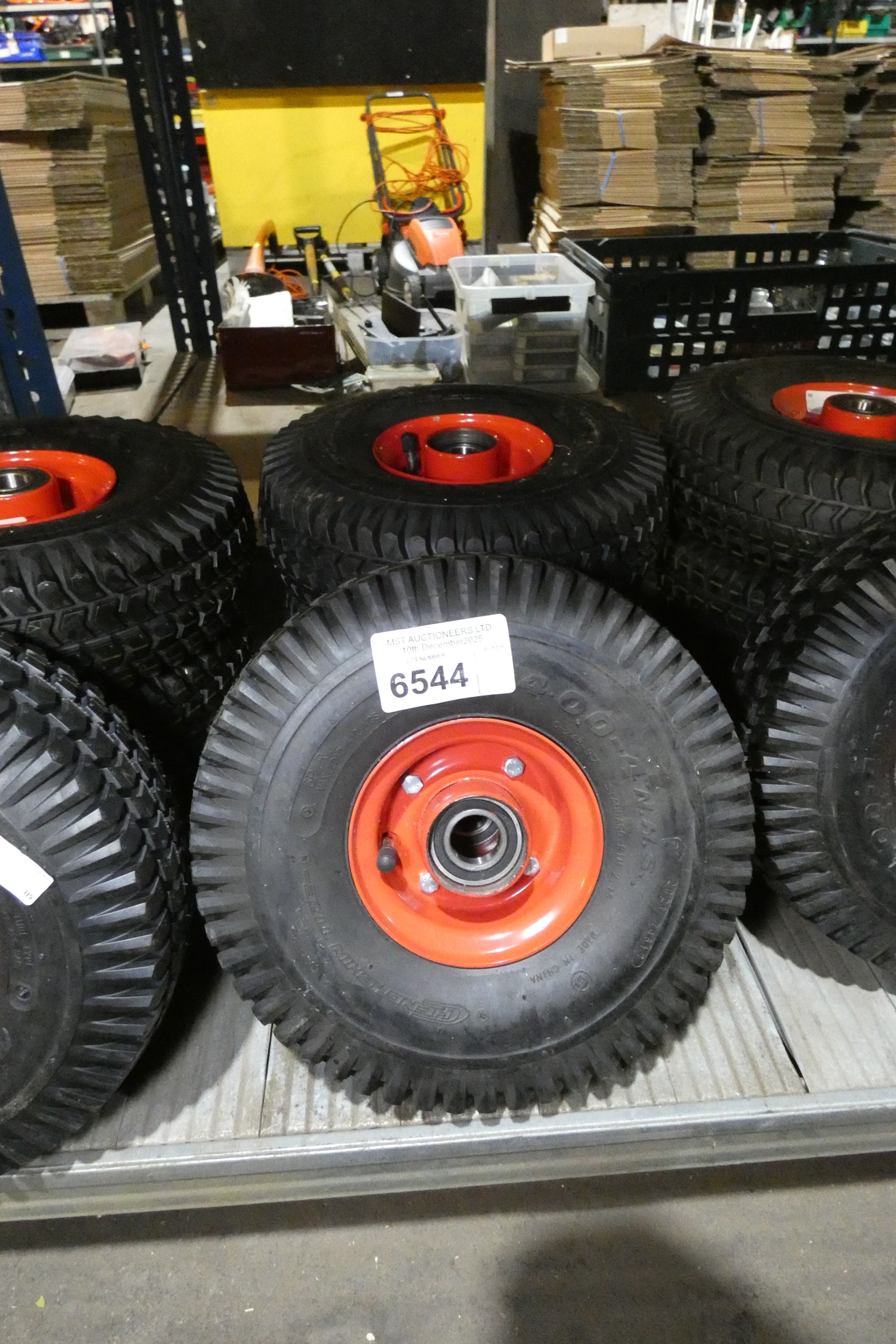 4 x small red metal wheels fitted with Cheng Shin 4.00-4 tyres
