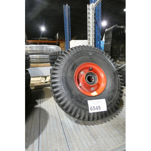 4 x small red metal wheels fitted with Cheng Shin 4.00-4 tyres