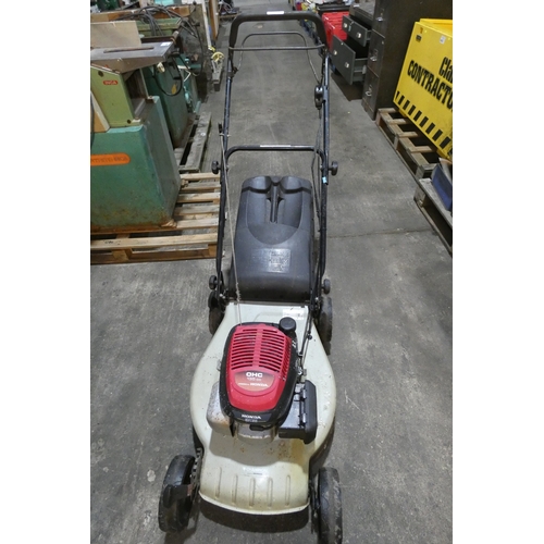 1 x Champion CR 534S lawn mower with a Honda pull start petrol engine