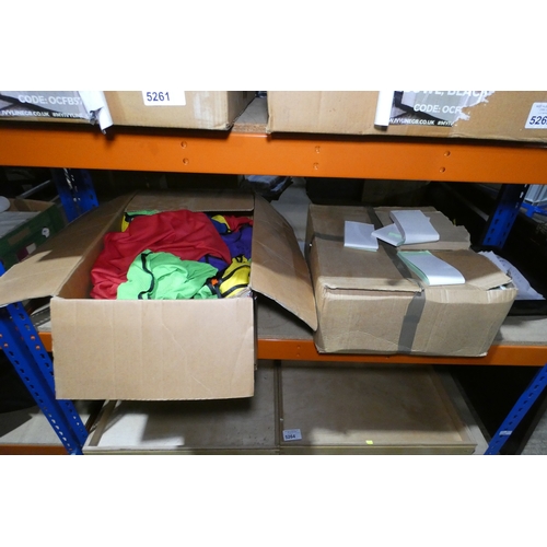 The contents of one shelf containing a box of restaurant table order ...