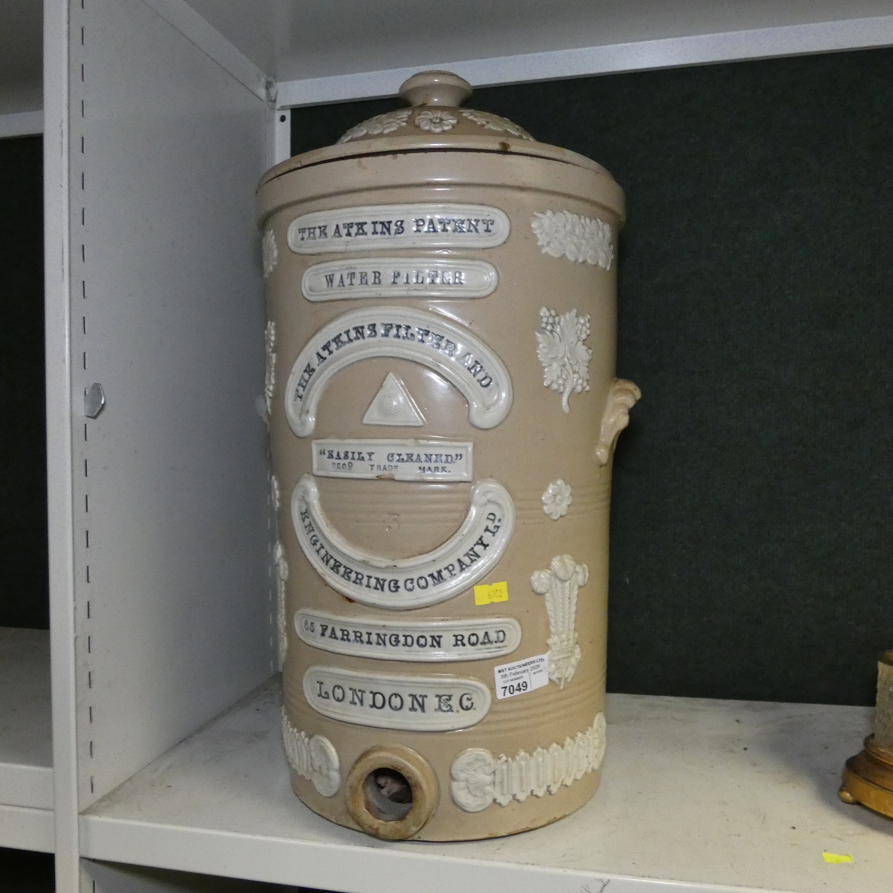 A Victorian decorative stoneware water filter by Atkins