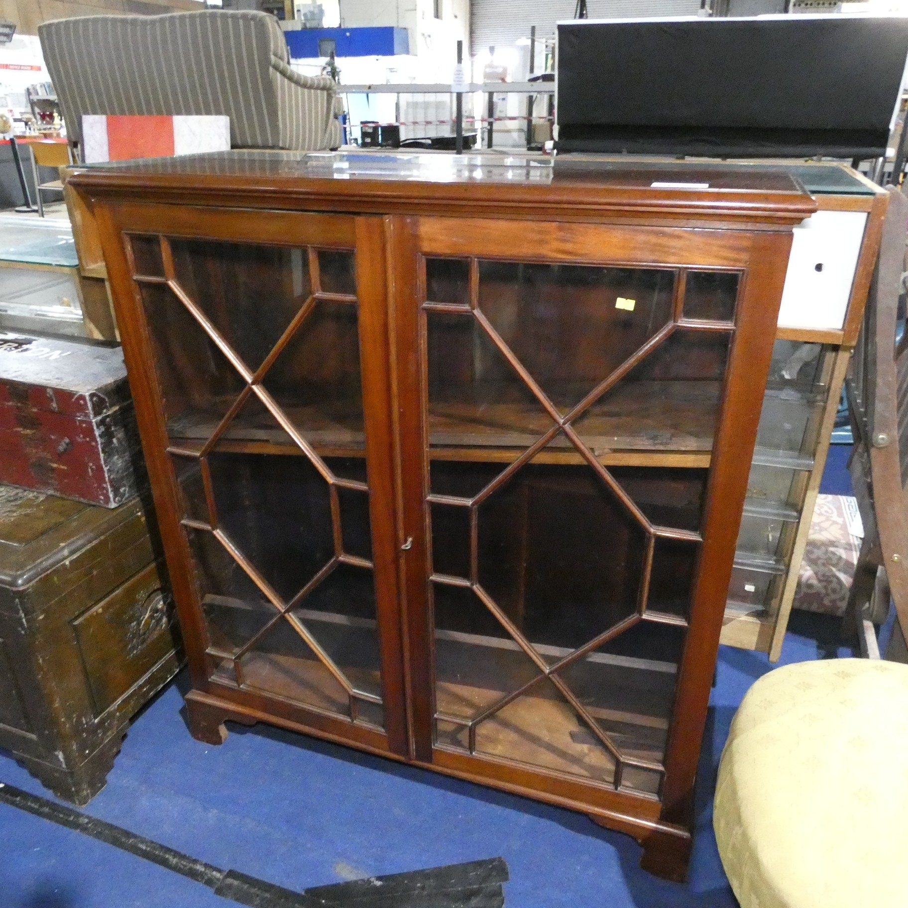 A reproduction mahogany floor standing display cabinet with two astral ...