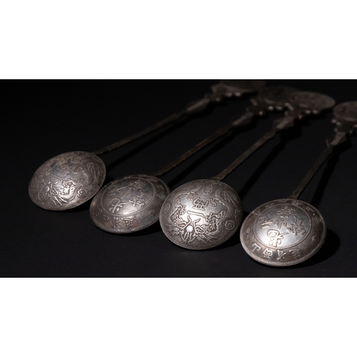 A Set of Four Chinese White Metal Coin Souvenir Spoons, Republican ...