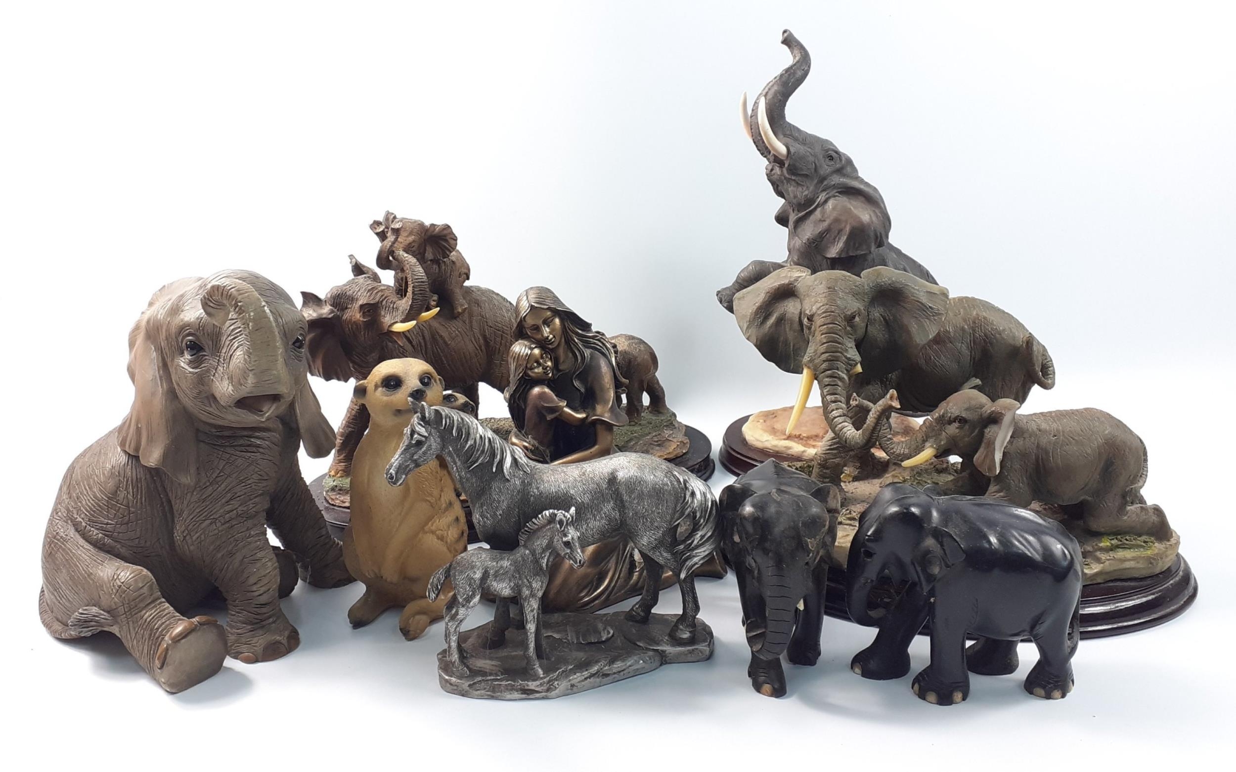 A vivid collection of elephants including the rearing elephant and ...