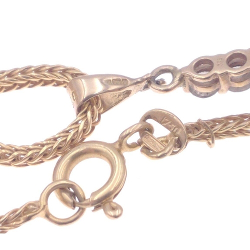 A 750 stamped 18ct yellow gold chain 48cm long, weight 10.43g with a ...
