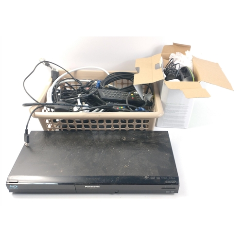 A PANASONIC DMP-BD45 Blu-Ray disc player with controls and cables plus ...