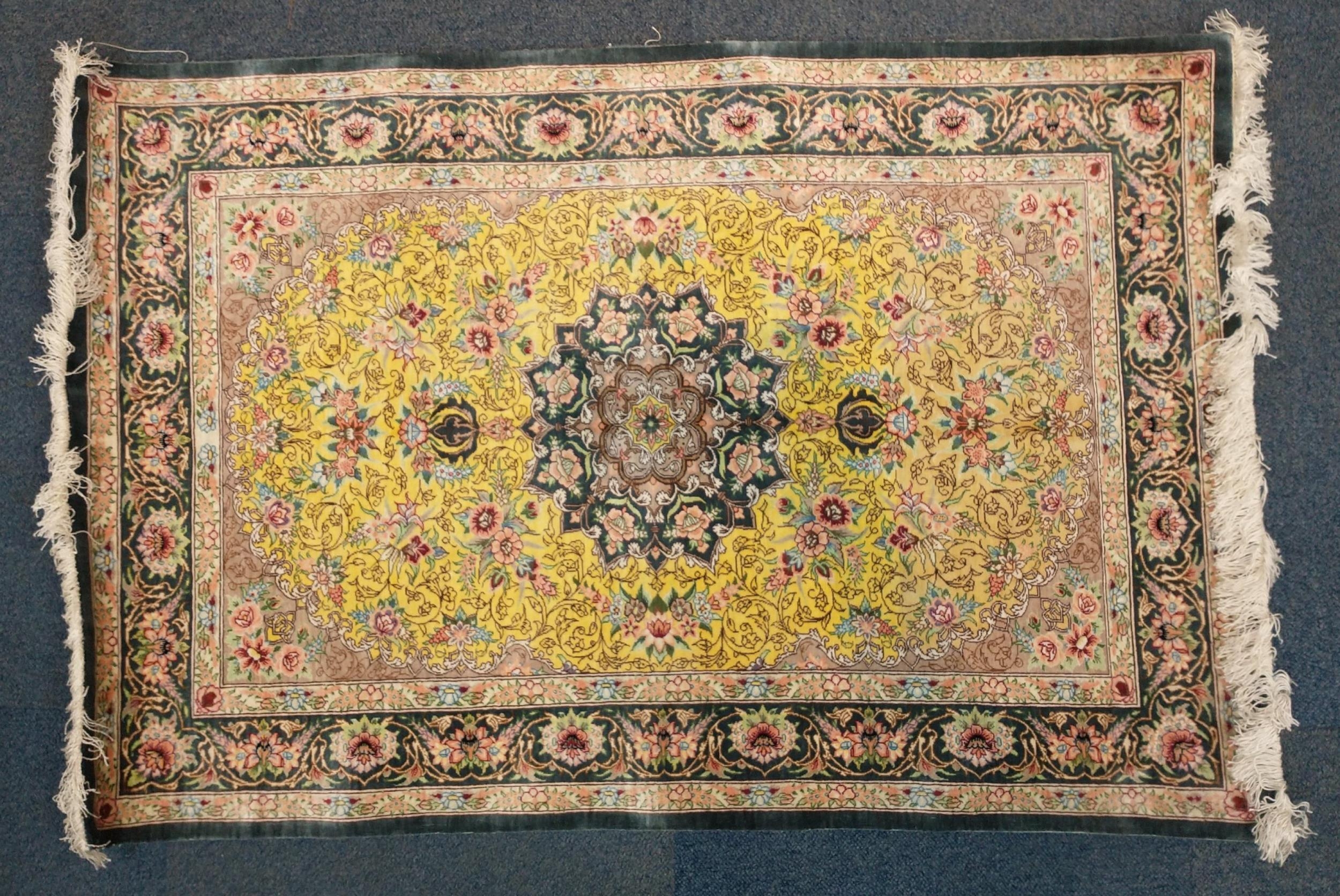 A silky Middle Eastern rug approx 78x120cm in trendy shades of grey and ...