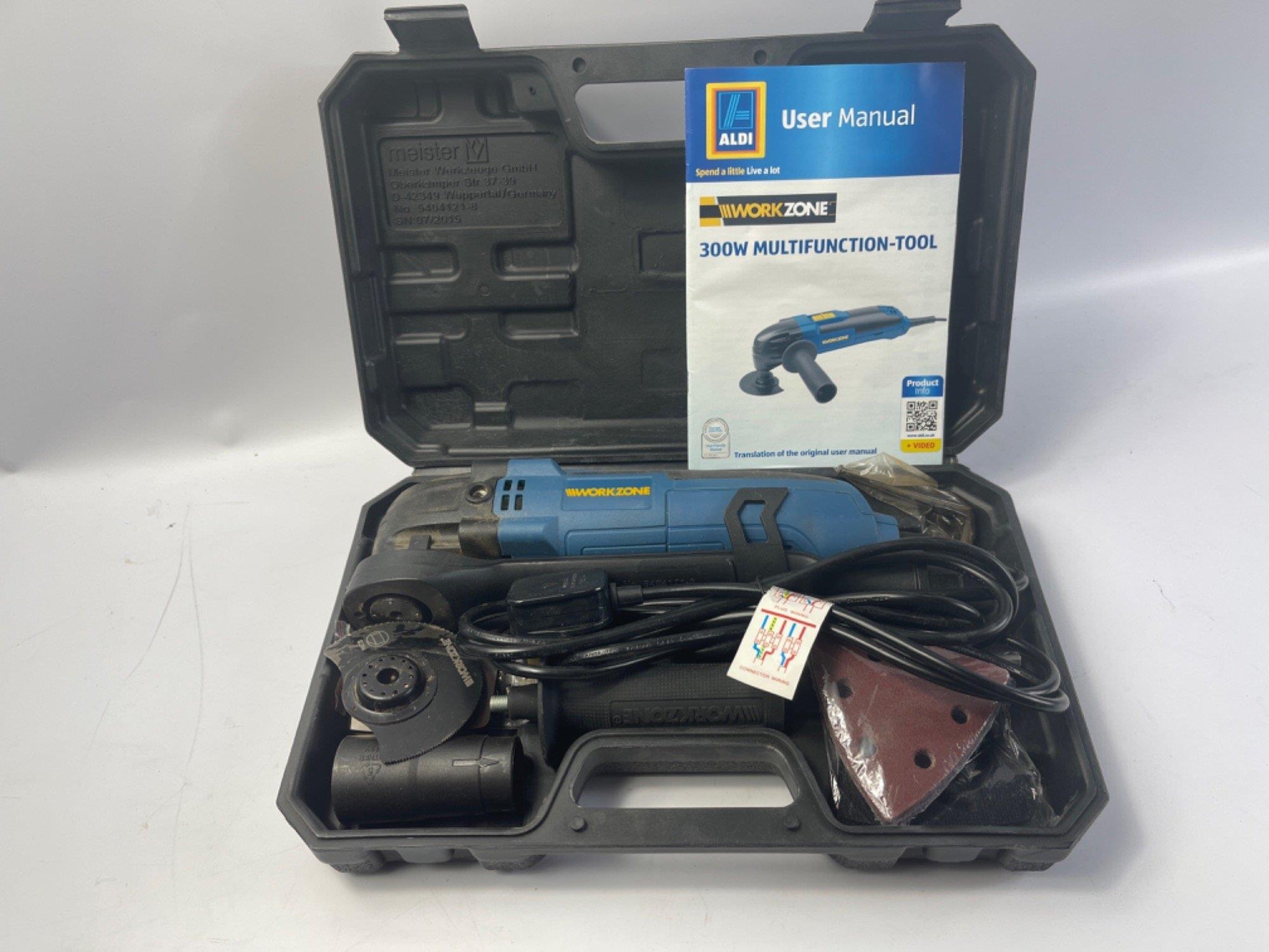 A WORKZONE 300W multifunction-tool with an unopened pack of discs#696