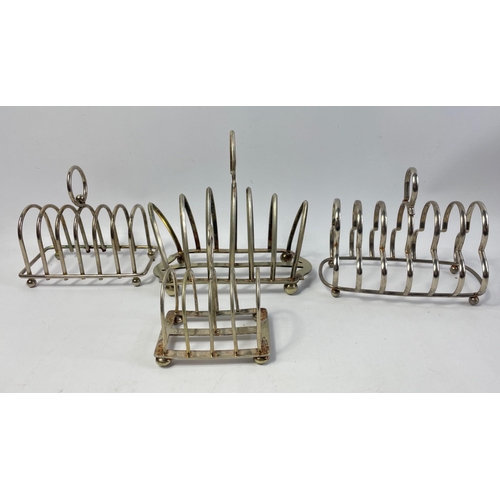 A lot of four antique plated TOAST RACKS. Stylish lot with some wear as ...